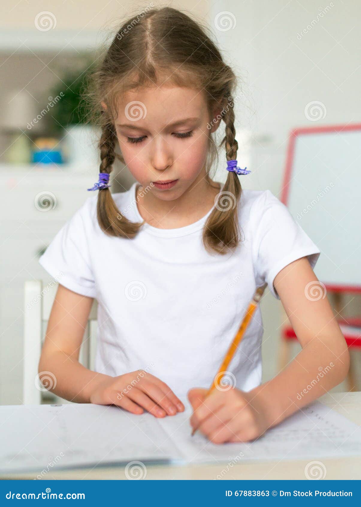 Girl doing homework. stock image. Image of beautiful - 67883863