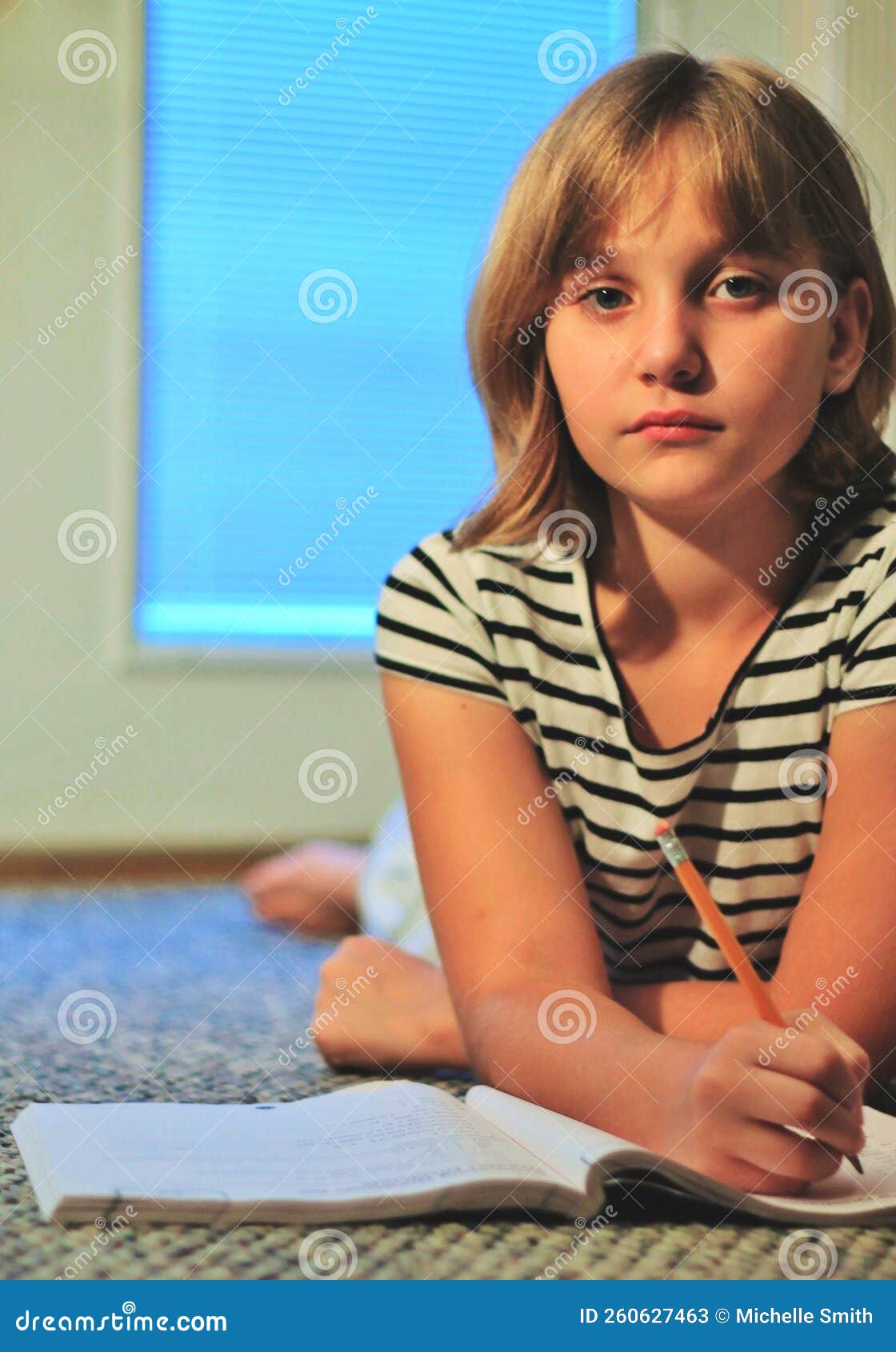 Girl Doing Homework with Pencil and Notebook Stock Image - Image of ...