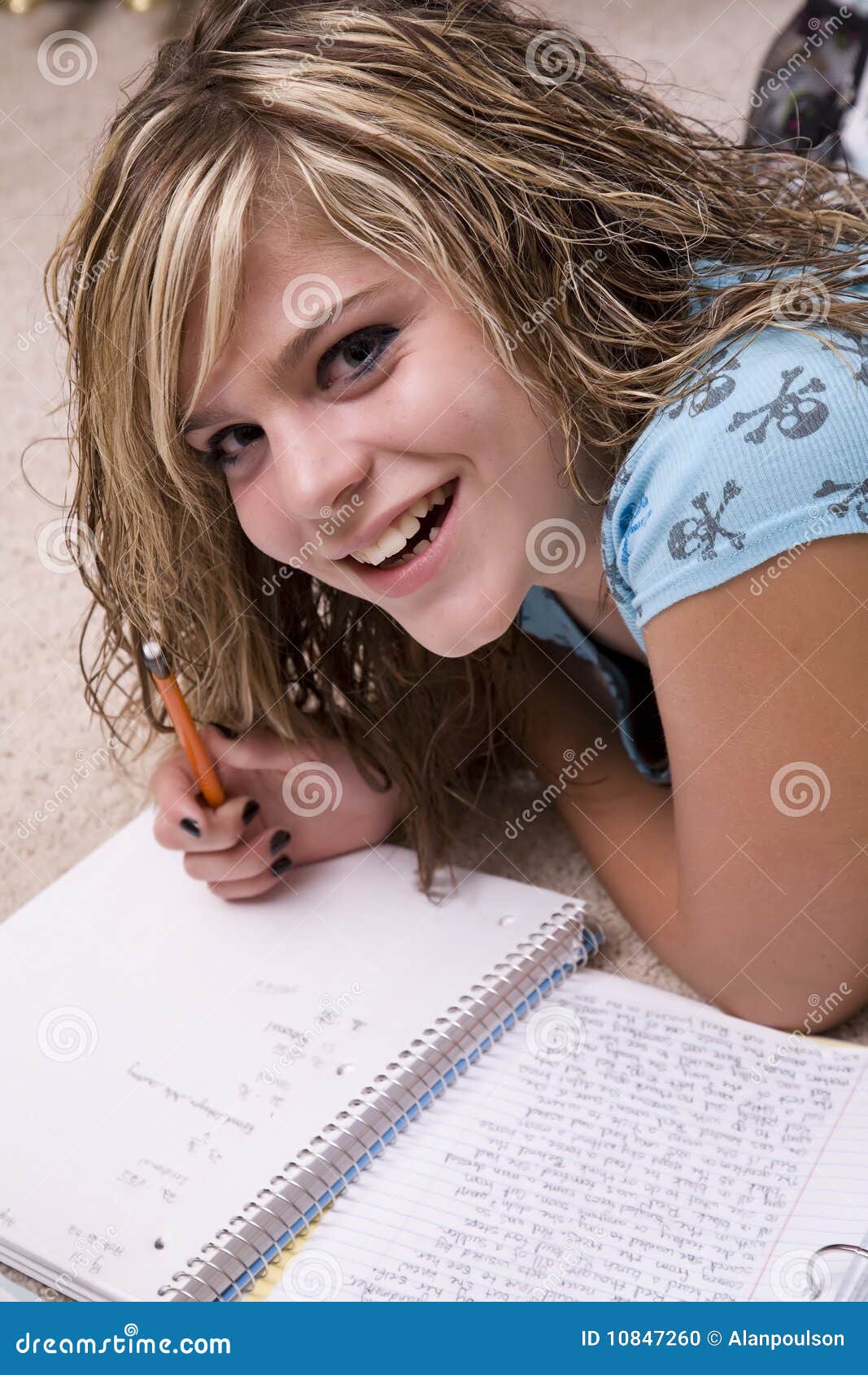 Girl Doing Homework and Smiling Stock Photo - Image of teenager, girl ...