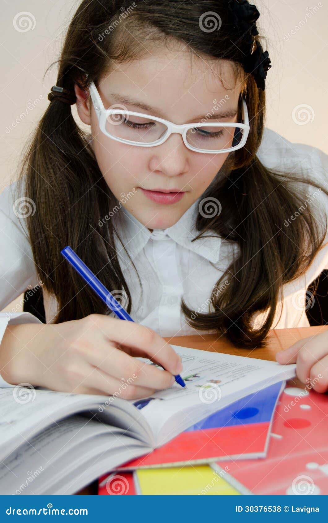 Girl doing homework stock photo. Image of concentration - 30376538