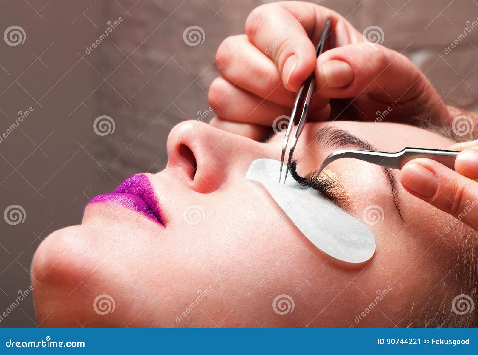 The girl doing the lashes stock image. Image of luxury - 90744221