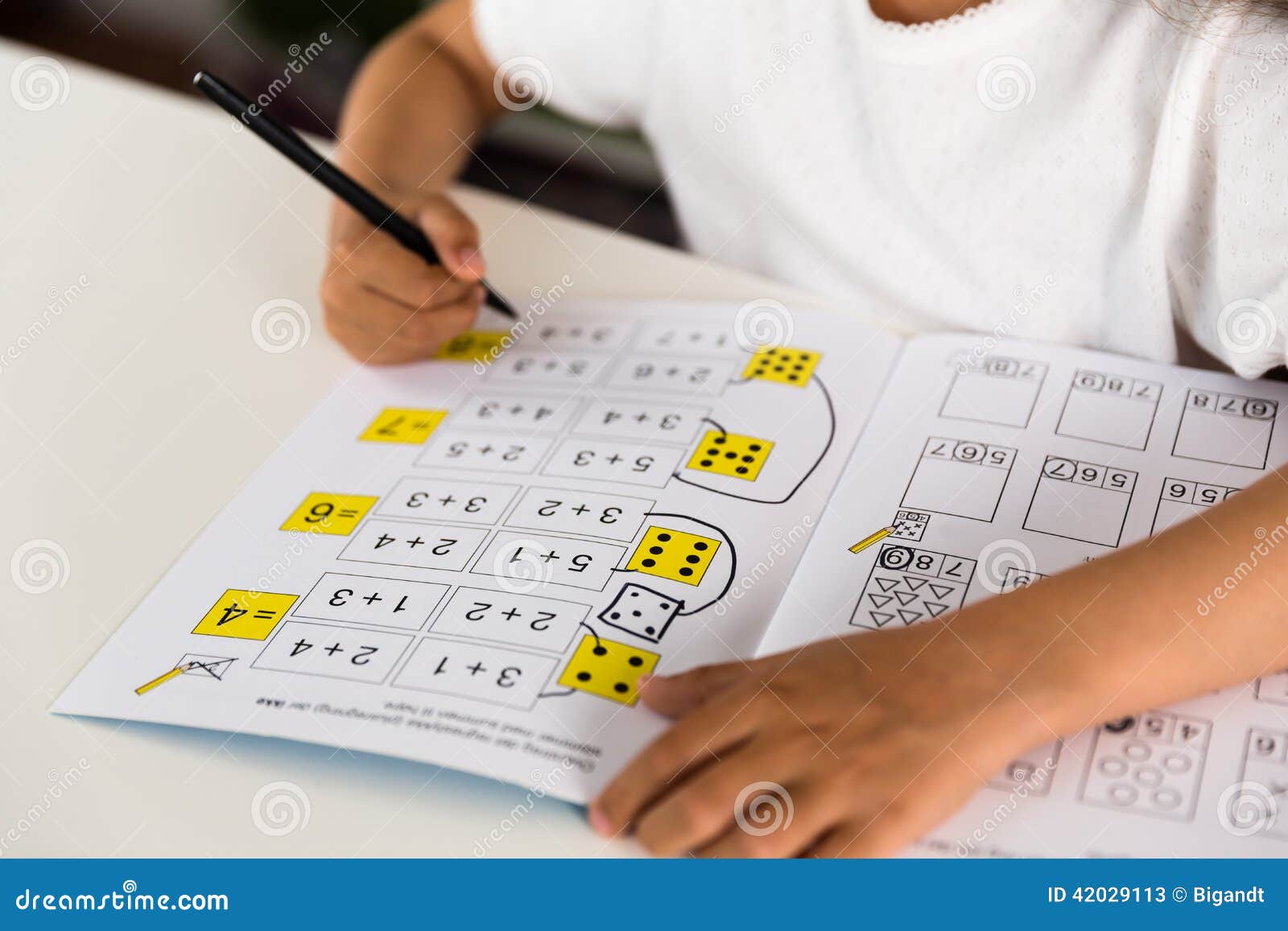 Girl doing math exercise stock image. Image of homework - 42029113