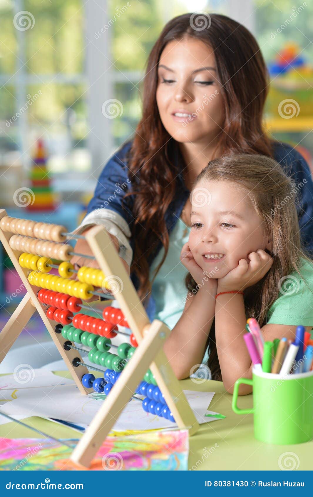 Girl doing math exercises stock photo. Image of bars - 80381430
