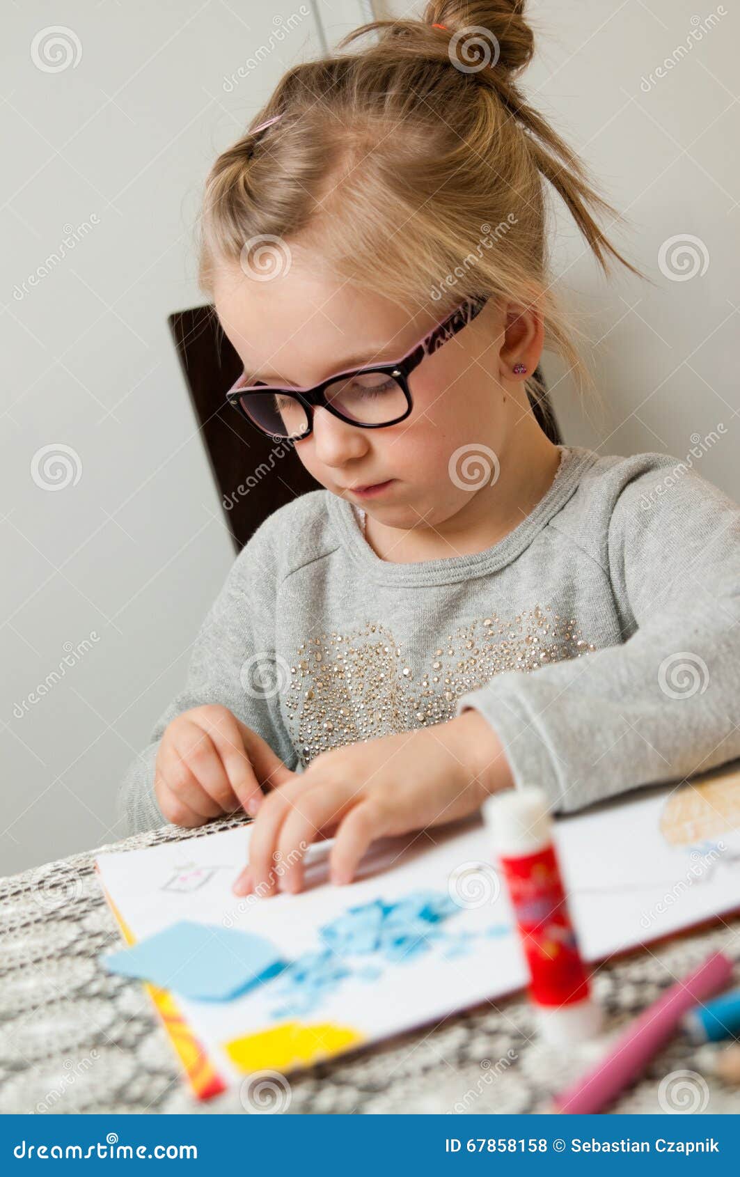 Girl Doing Paper Art Work at Home Stock Photo - Image of spectacles ...