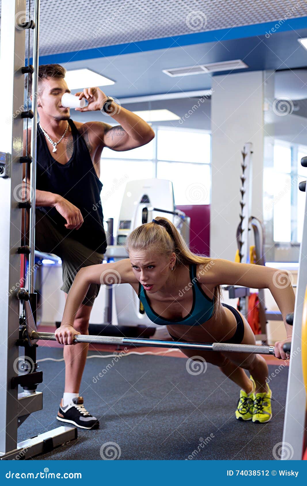 Girl Doing Push-ups and Her Trainer Drinking Water Stock Photo - Image ...