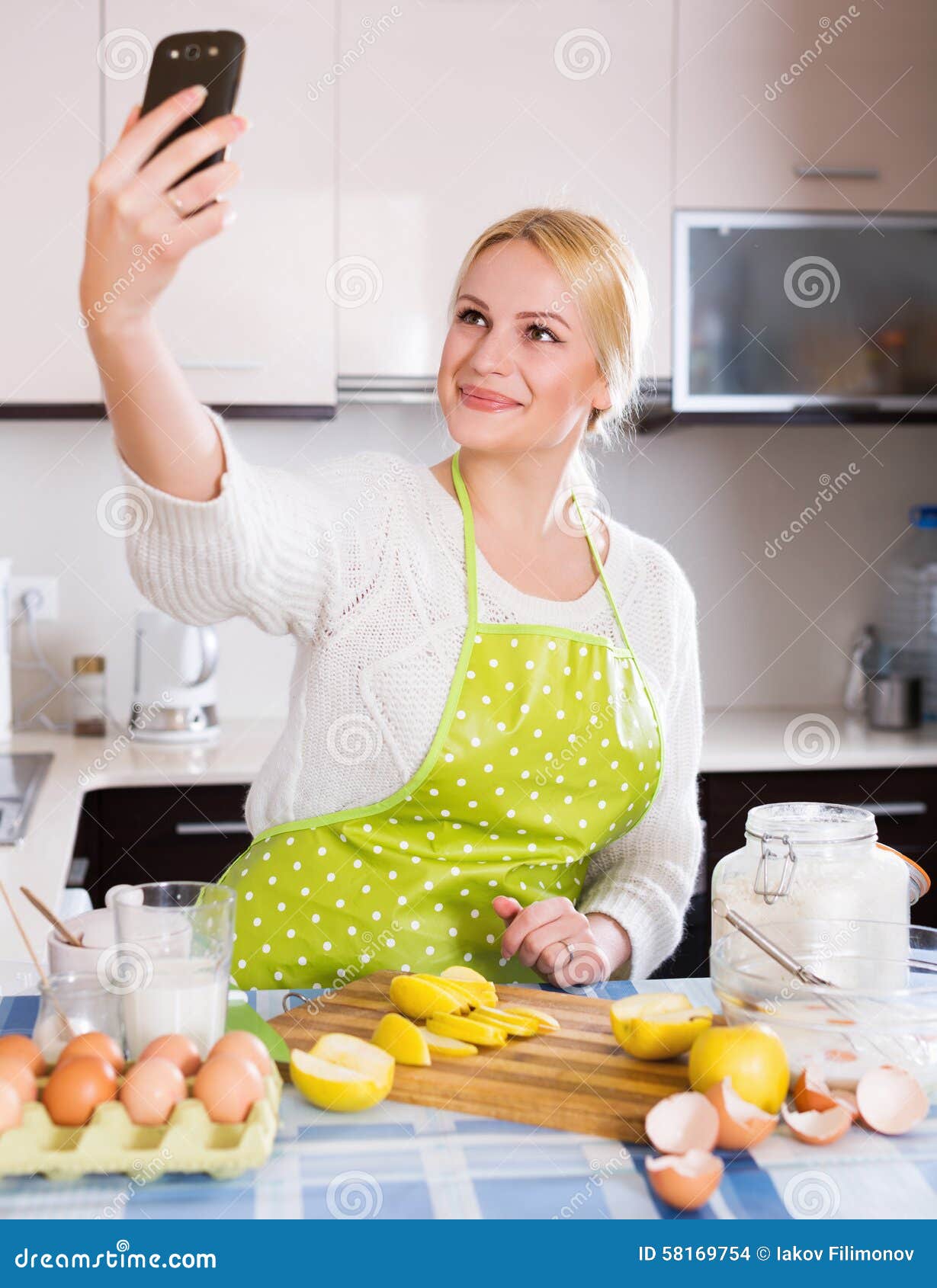Girl Doing Selfie at Kitchen Stock Photo - Image of european, cloth ...