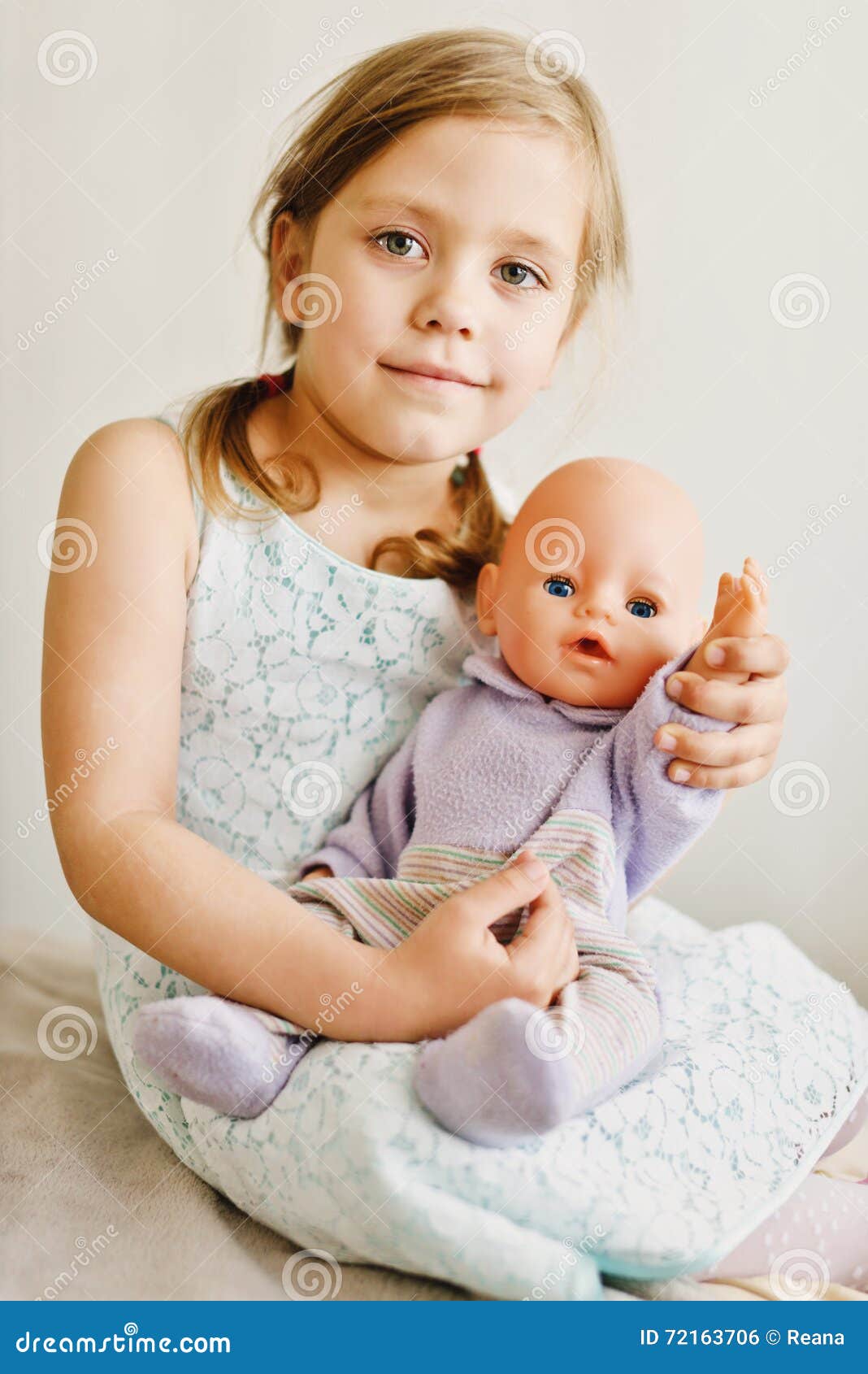 Girl with doll stock photo. Image of enjoy, portrait - 72163706