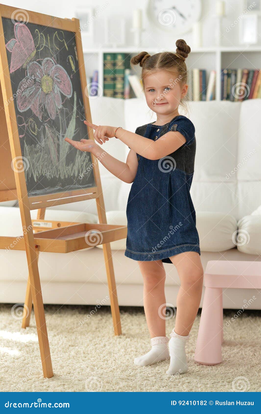 Girl drawing on chalkboard stock photo. Image of child - 92410182