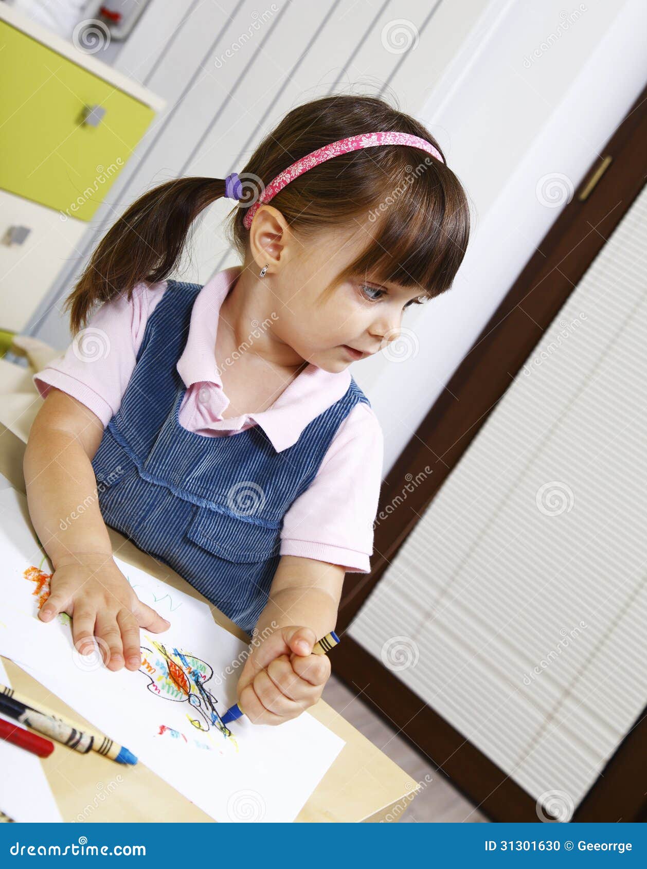 Girl drawing with crayons stock photo. Image of paper - 31301630
