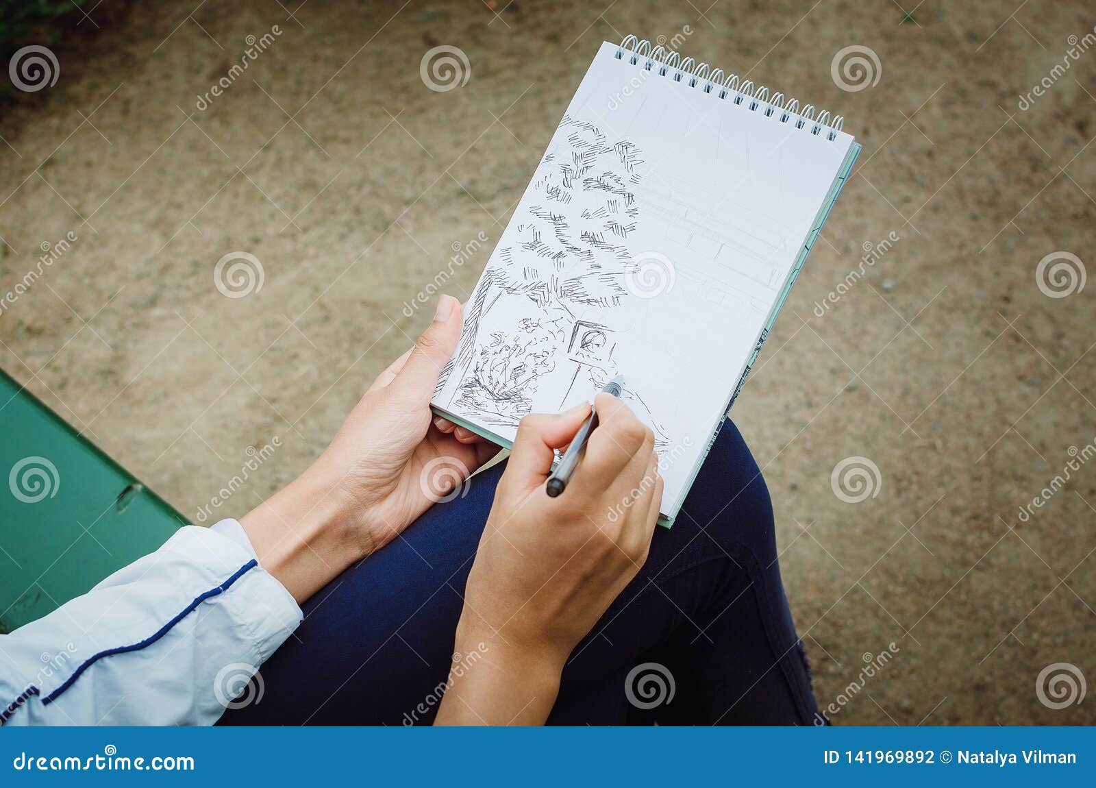 The Girl Draws in a Notebook. Hands Close-up Stock Illustration ...