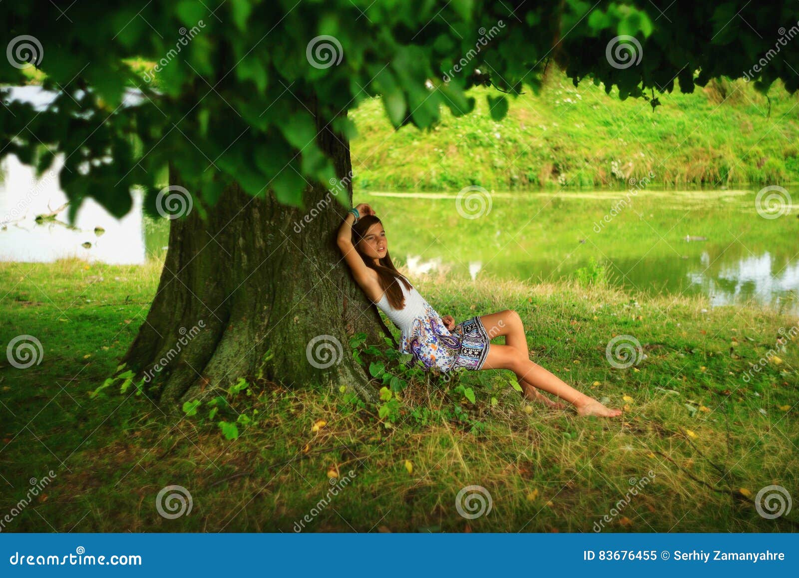 A girl dreaming under tree stock image. Image of farm - 83676455