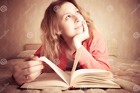 Girl Dreams Reading the Book Stock Image - Image of look, dreamy: 4724251