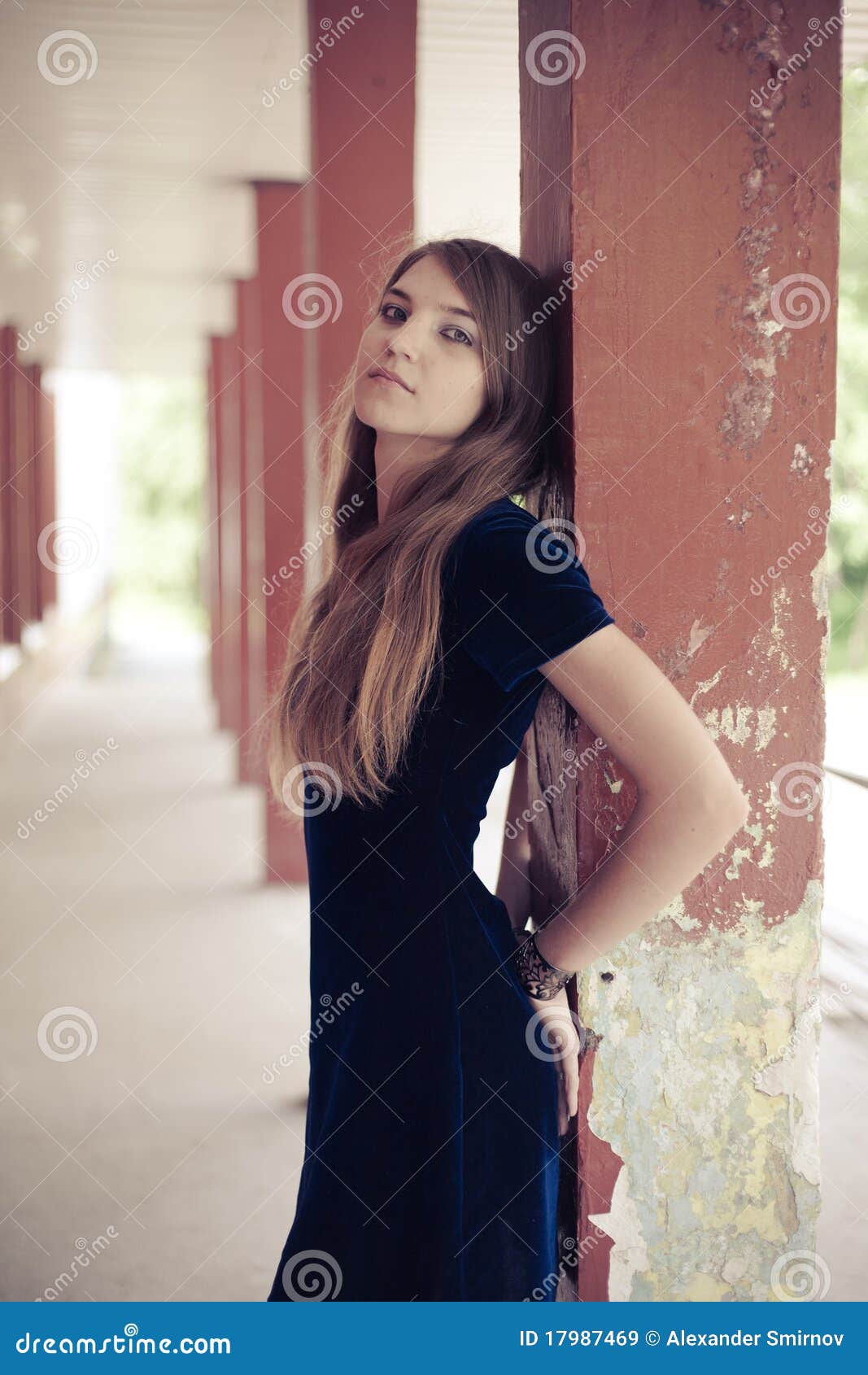 Girl in a Dress by the Columns Stock Image - Image of dusk, diva: 17987469