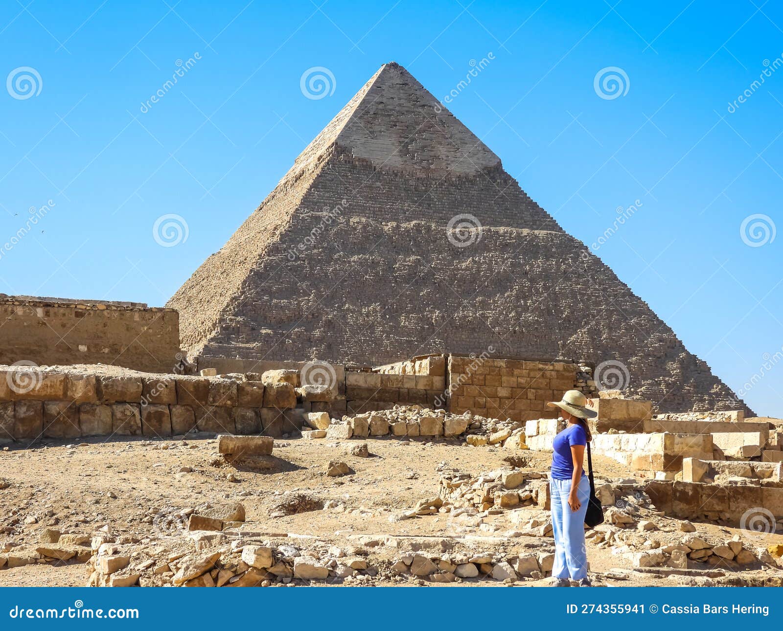 Girl Dressed in Blue with a Hat, Looking at the Pyramid Stock Image ...