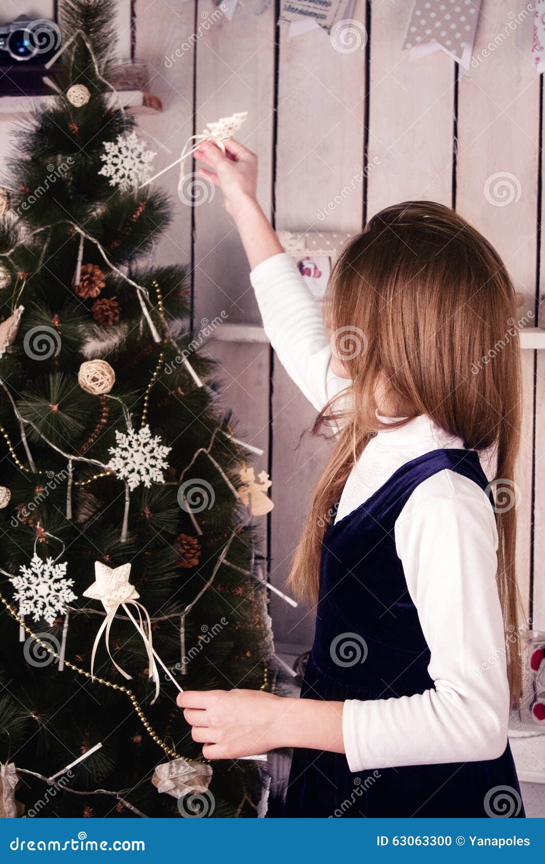 Girl Dressing Up Christmas Tree Stock Photo - Image of greeting ...