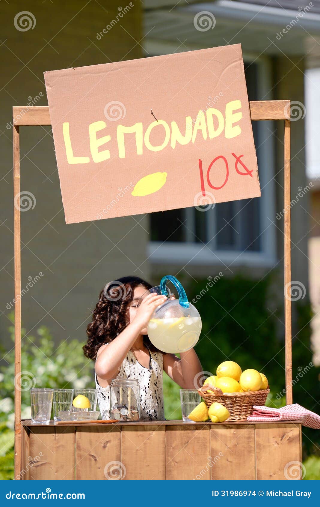 Girl Drinking Lemonade from a Pitcher Stock Photo - Image of drink ...