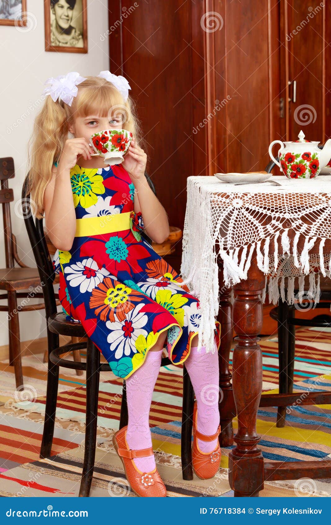 Girl drinking tea stock photo. Image of girls, holding - 76718384