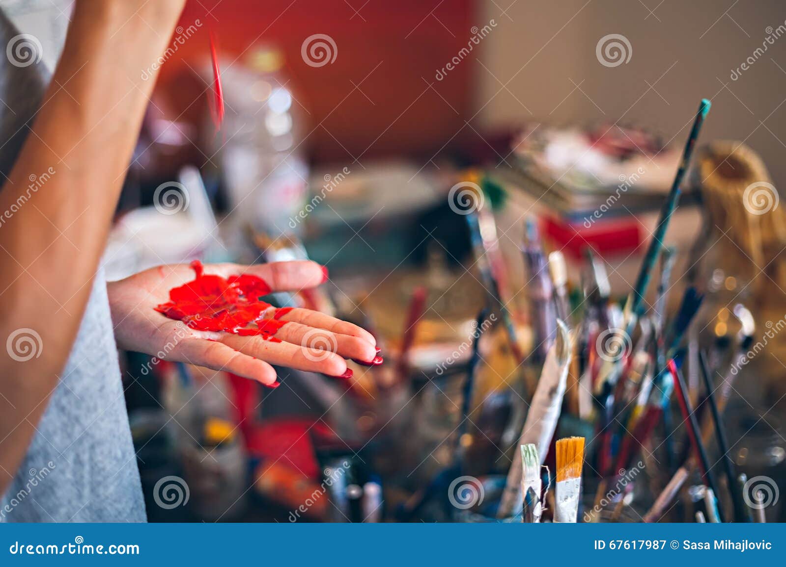 Girl Dripping Paint on Her Hand Stock Image - Image of painting, messy ...