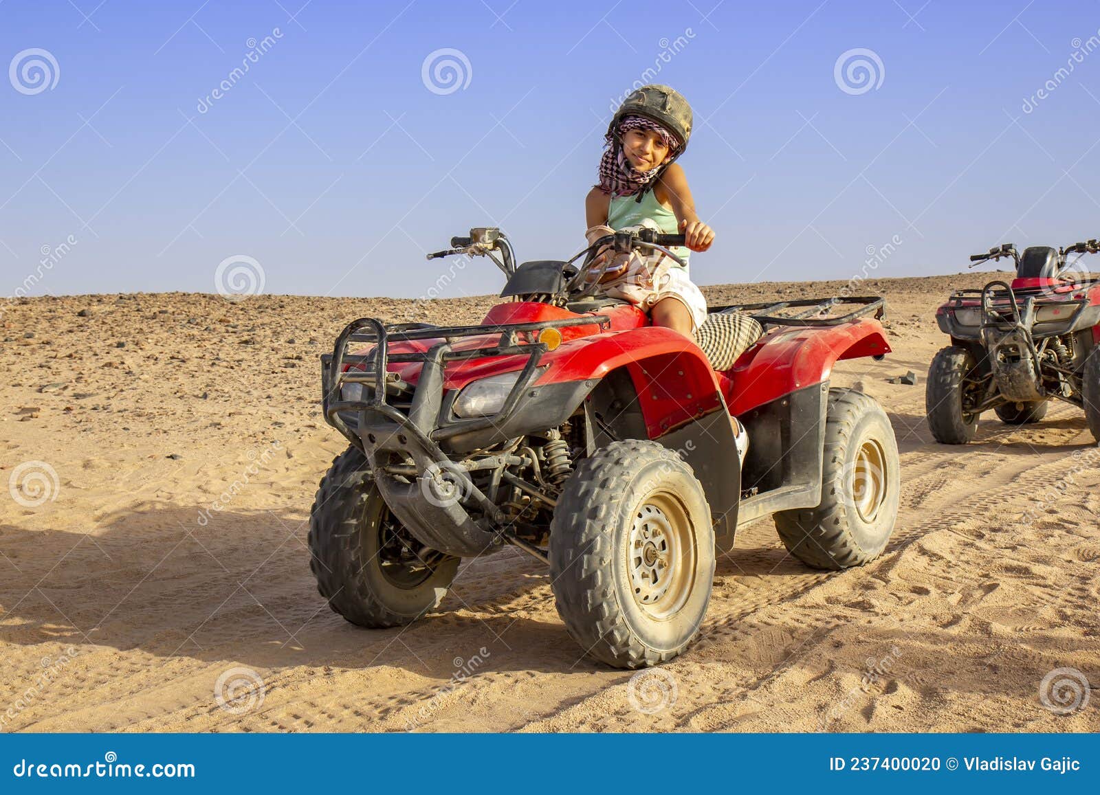 Girl Driving ATV in the Desert Stock Photo - Image of driving, leisure ...