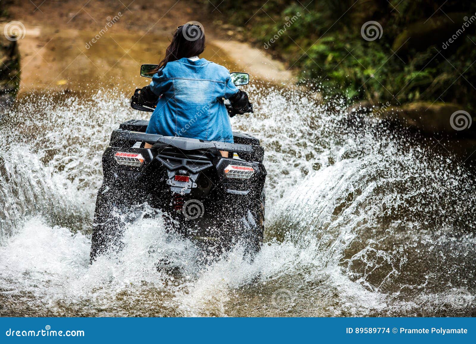 The Girl Driving an ATV through the River Spree. Stock Photo - Image of ...