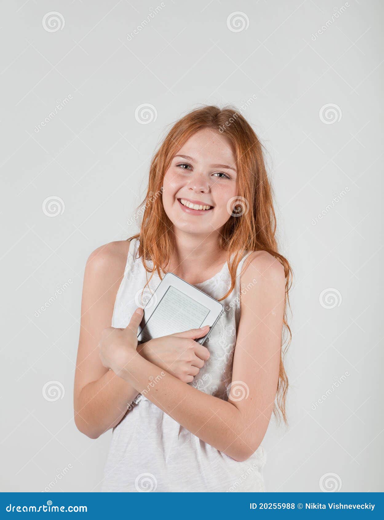 Girl with e-book stock photo. Image of girl, studio, young - 20255988