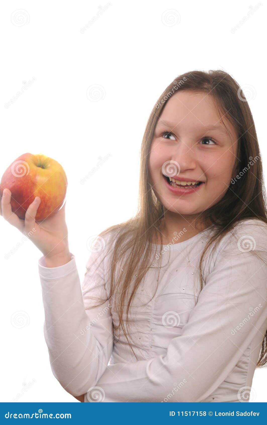 Girl eaing an apple stock photo. Image of smile, teen - 11517158