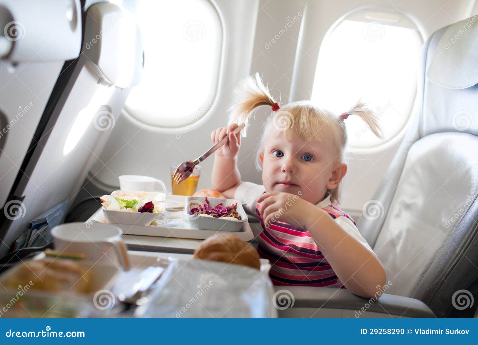 Girl Eating in the Airplane Stock Photo - Image of passenger, journey ...