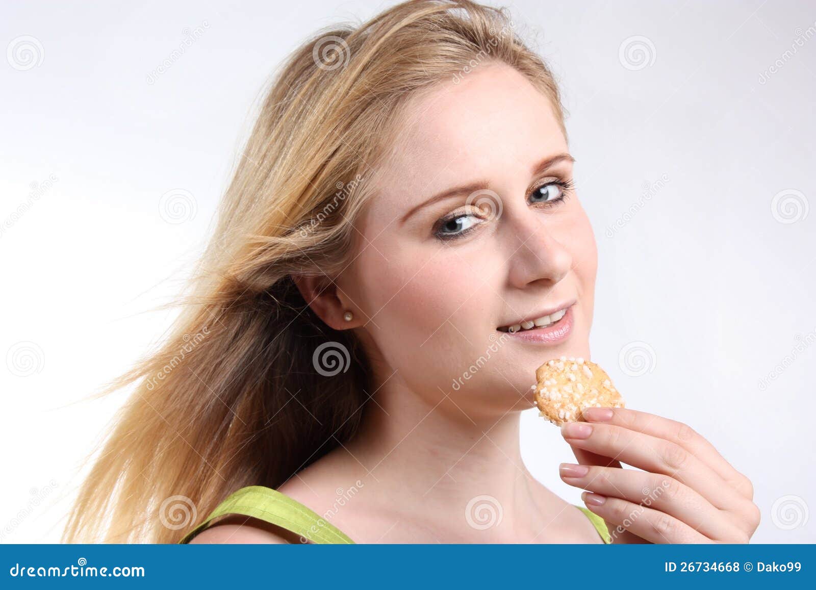 Girl eating biscuit stock photo. Image of taste, girl - 26734668