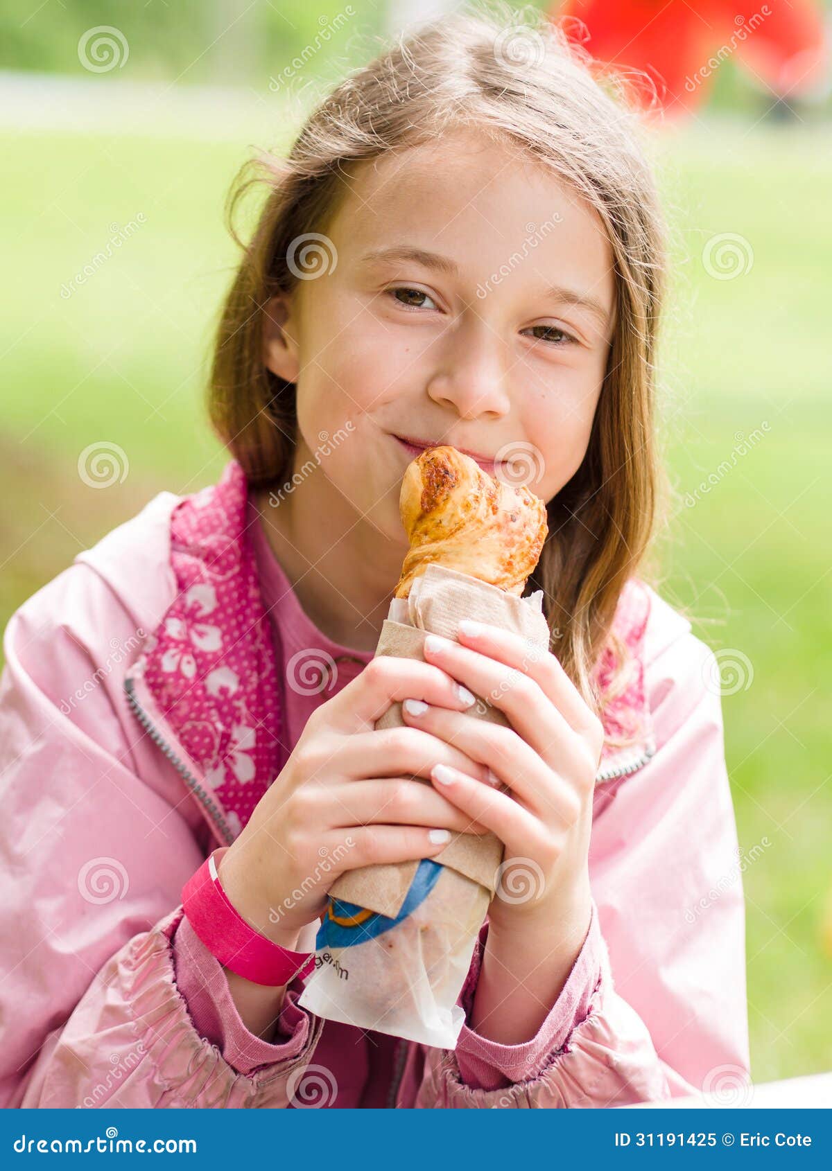 Girl eating bread stock image. Image of female, delicious - 31191425