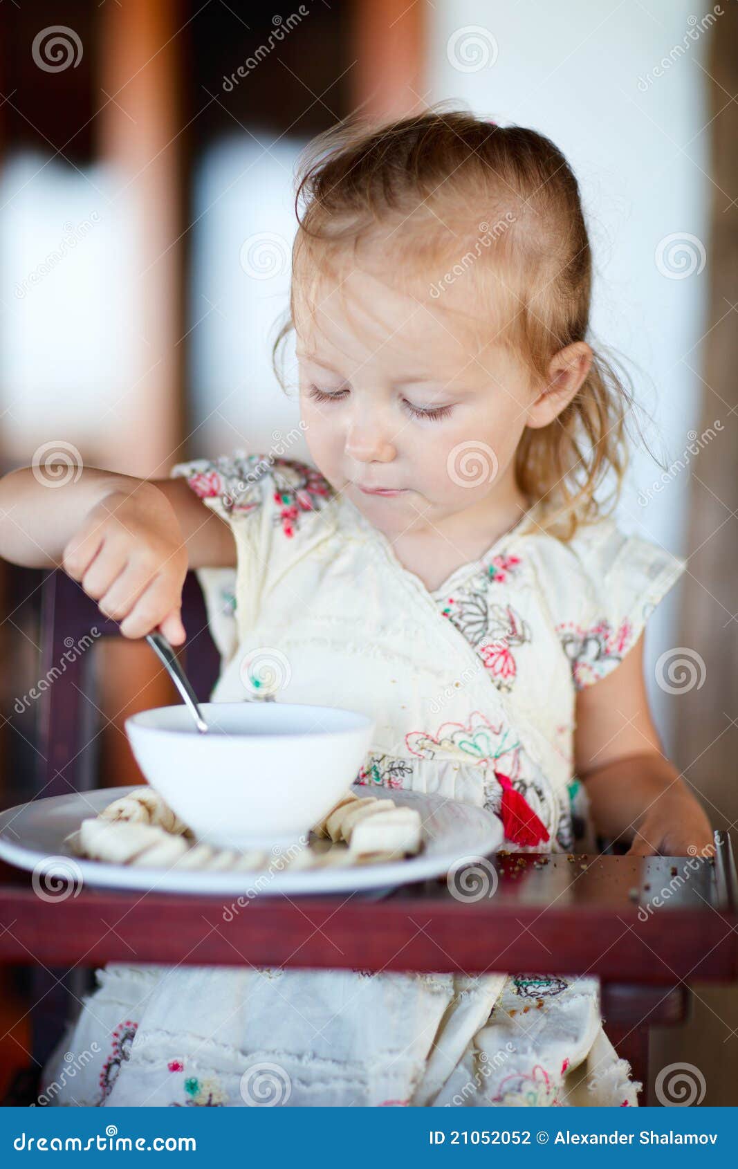 Girl eating breakfast stock photo. Image of people, food - 21052052