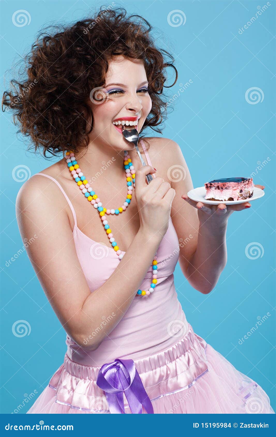Girl eating cake stock photo. Image of beads, eating - 15195984