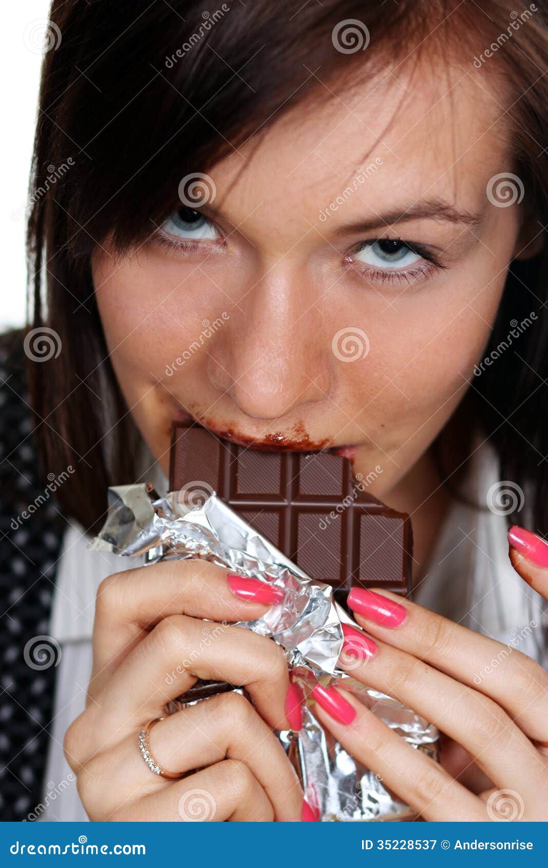 Girl eating a chocolate stock image. Image of portrait - 35228537