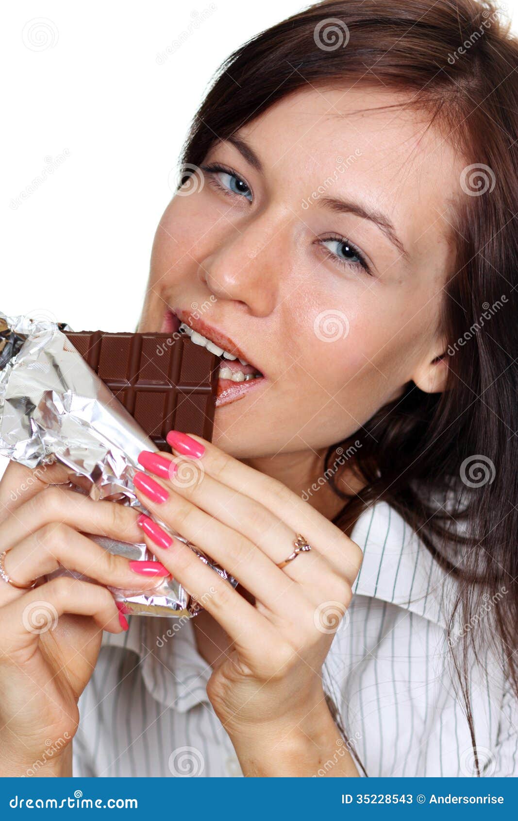 Girl eating a chocolate stock image. Image of dessert - 35228543