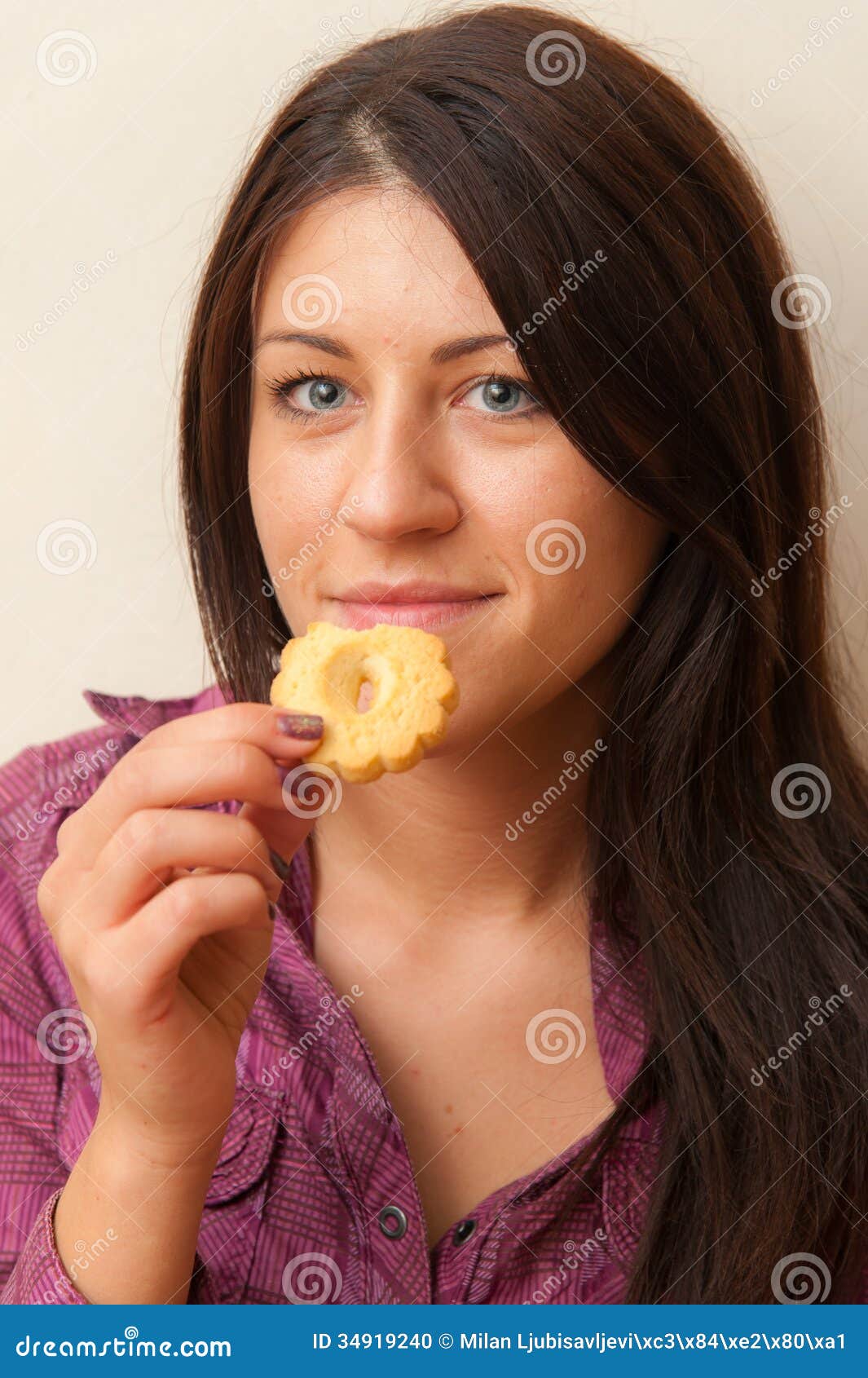 Girl Eating Cookie stock photo. Image of lifestyle, black - 34919240