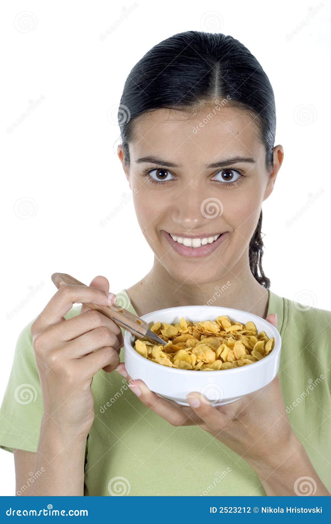 Girl eating cornflakes stock photo. Image of energy, happy - 2523212