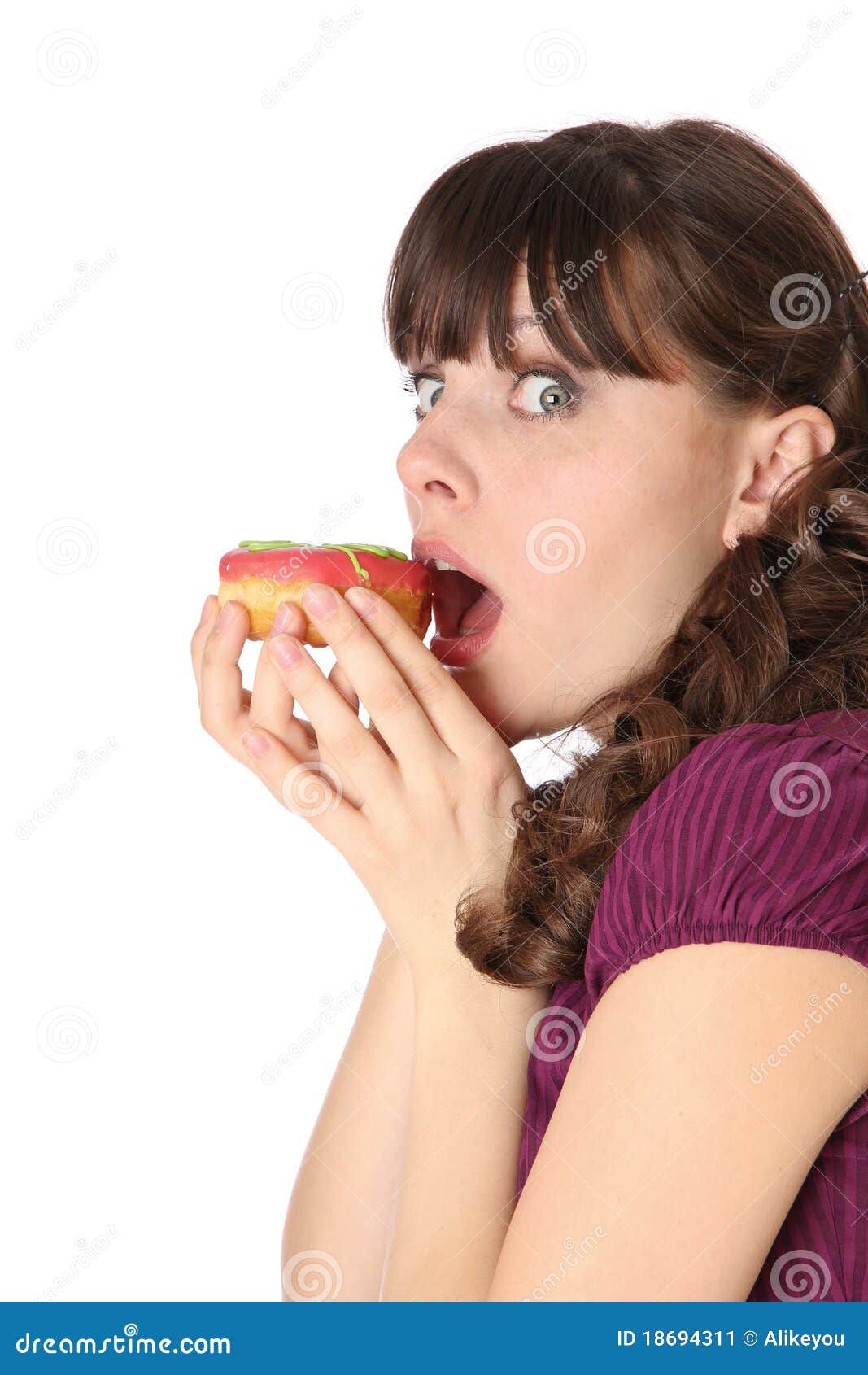 Girl Eating a Donut with Caution Stock Image - Image of hair, model ...