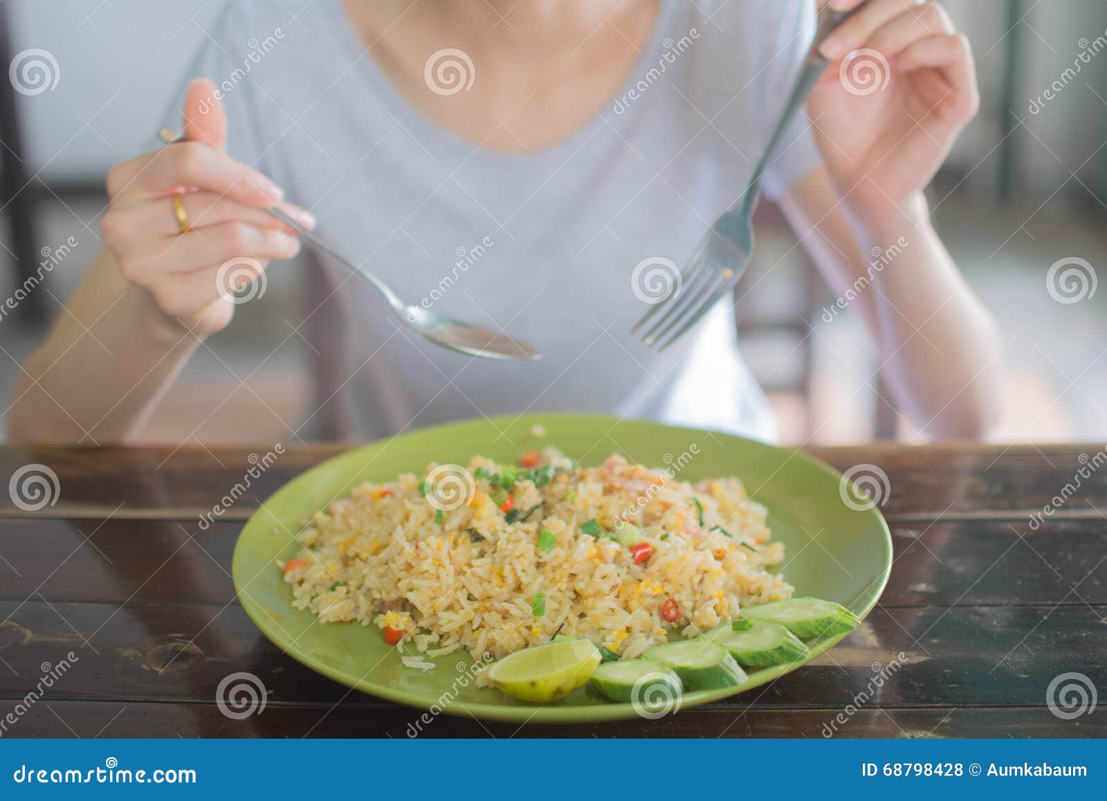 Girl Eating Fried Rice on Soft Focus Stock Photo - Image of fish ...