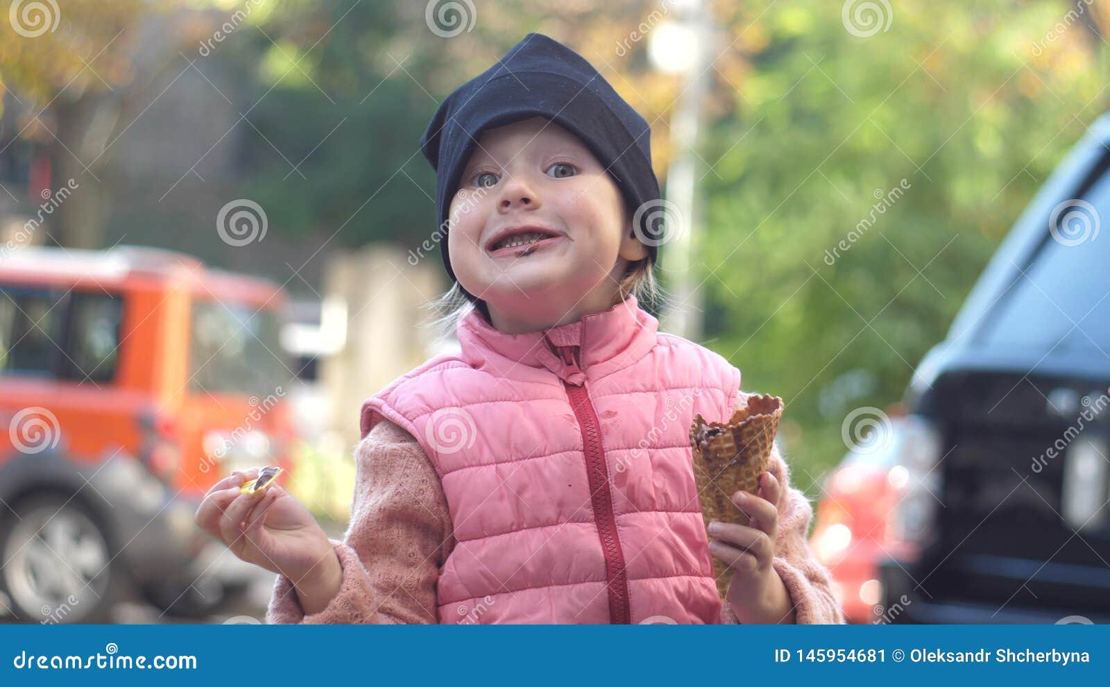 Girl Eating an Ice Cream and Smiles. Stock Image - Image of happy, care ...