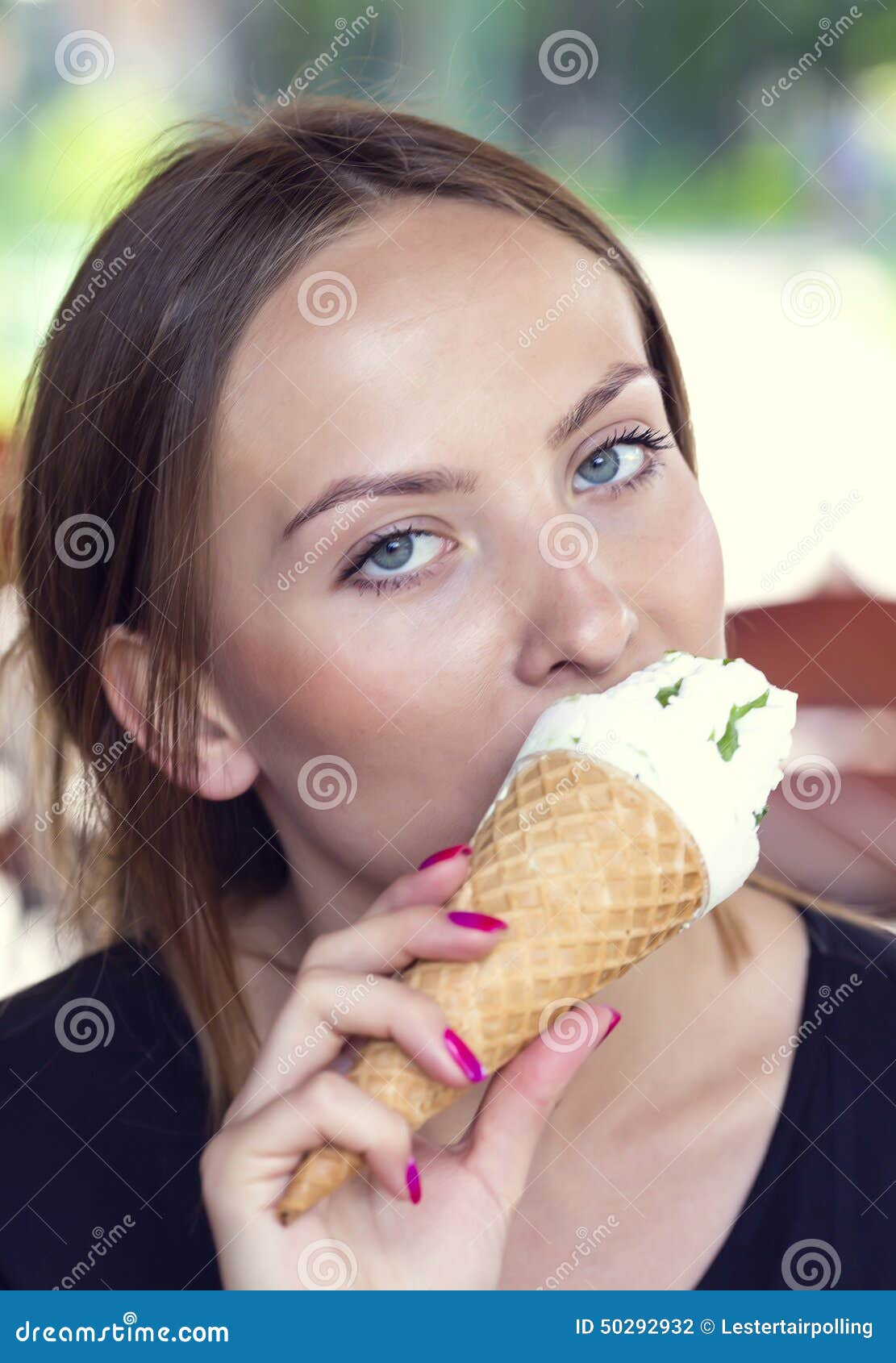 Girl eating ice cream stock photo. Image of cone, expression - 50292932
