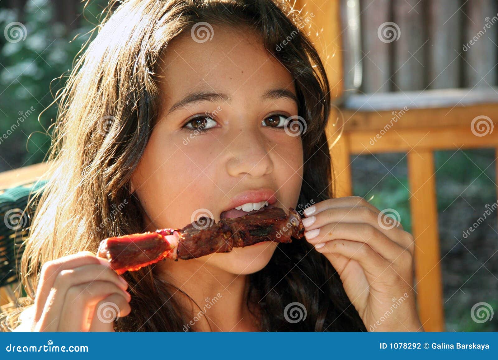 Girl eating kebab stock photo. Image of hunger, happy - 1078292