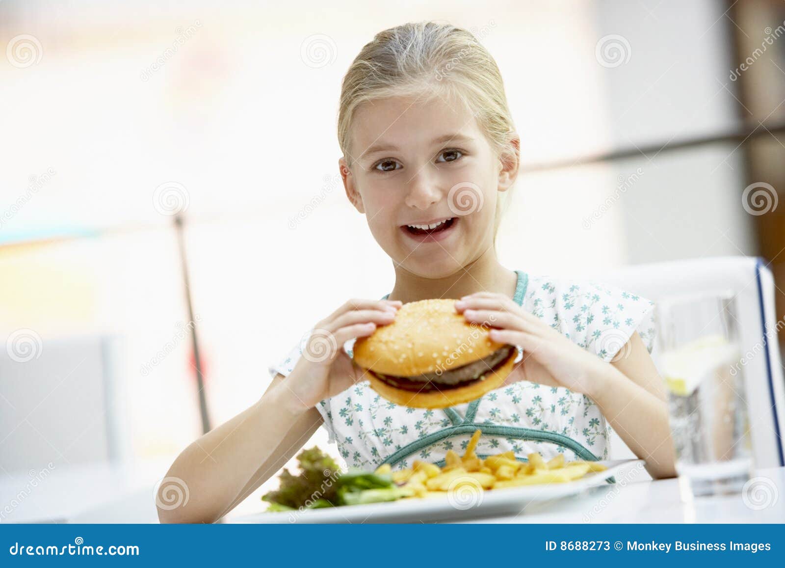 Girl Eating Lunch at a Cafe Stock Image - Image of burger, cafe: 8688273