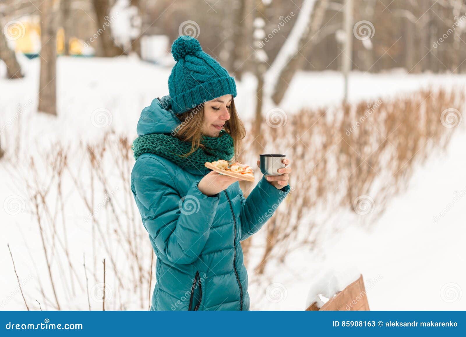 Girl Eating Pizza in the Cold Winter Stock Image - Image of warm ...