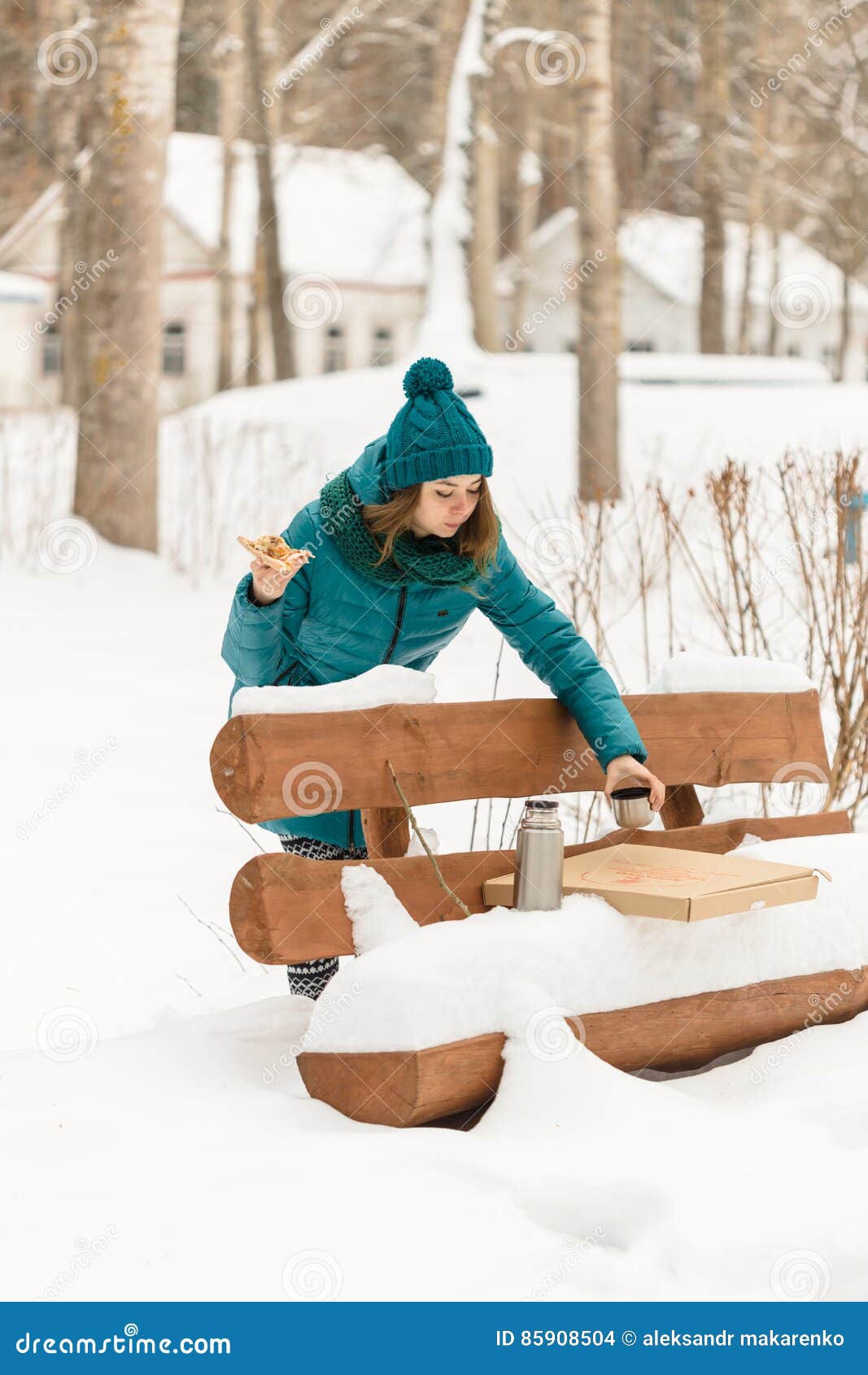 Girl Eating Pizza in the Cold Winter Stock Photo - Image of street ...