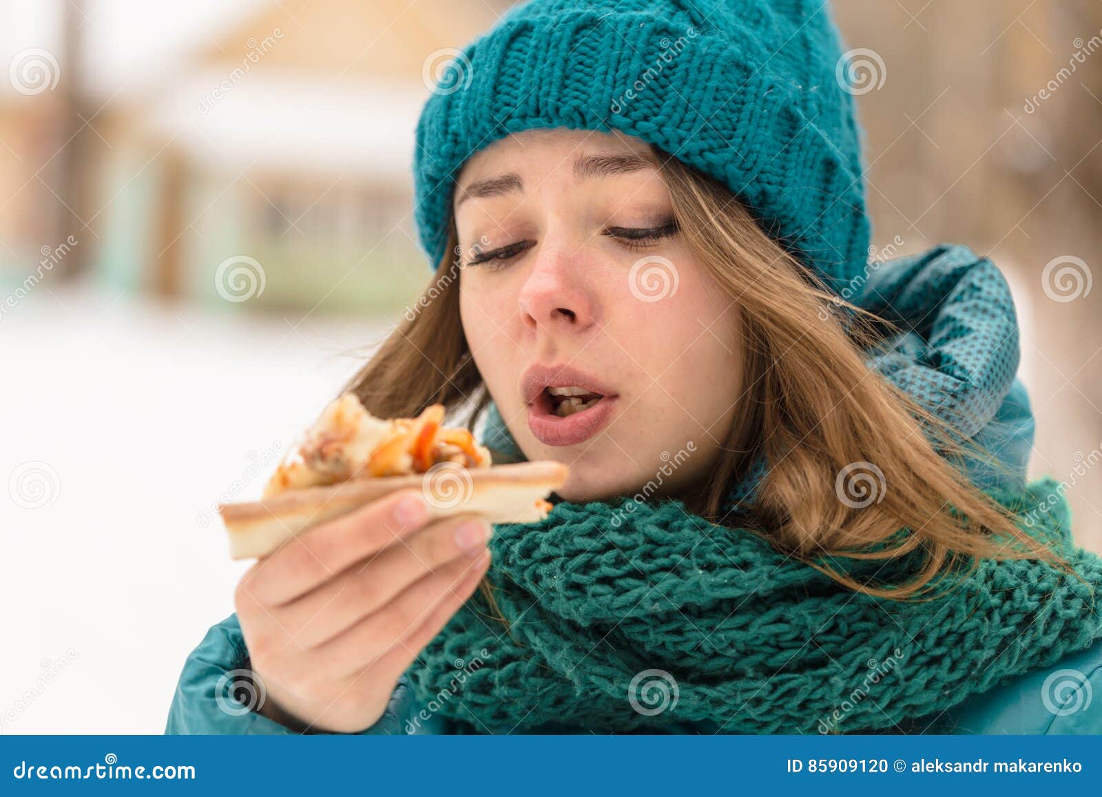 Girl Eating Pizza in the Cold Winter Stock Photo - Image of female ...