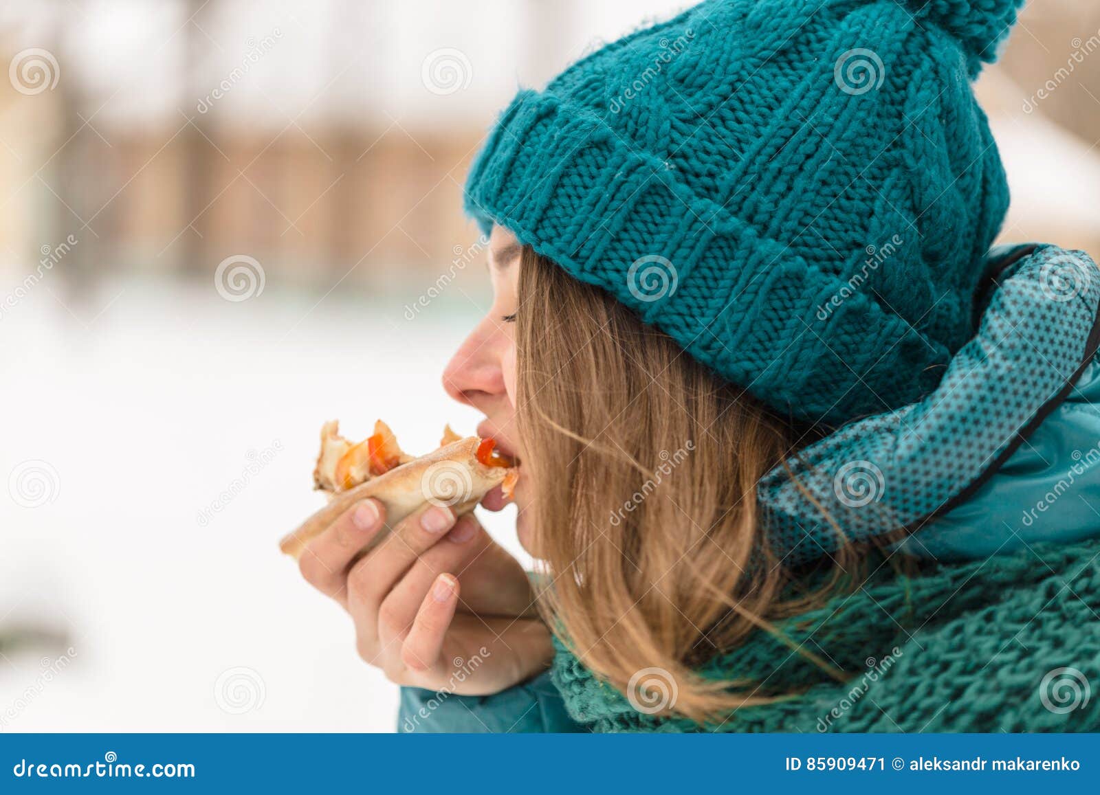 Girl Eating Pizza in the Cold Winter Stock Image - Image of street ...
