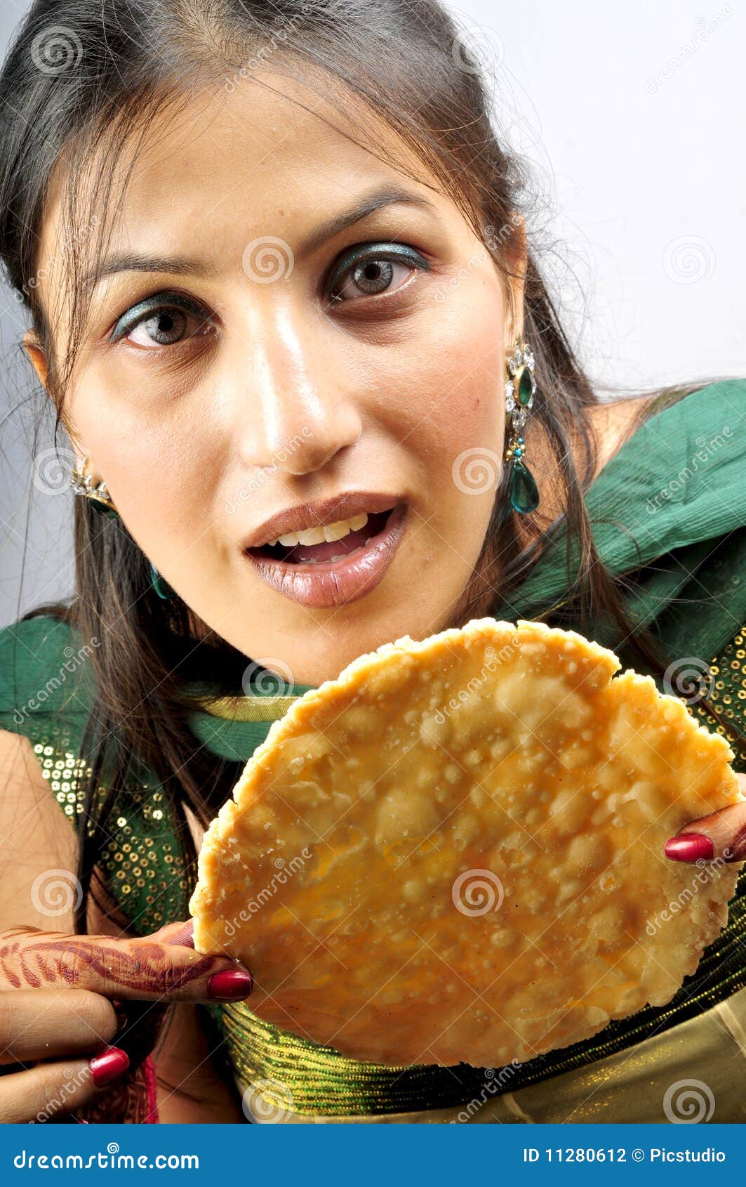 Girl eating poppadom stock photo. Image of smiling, lipstick - 11280612
