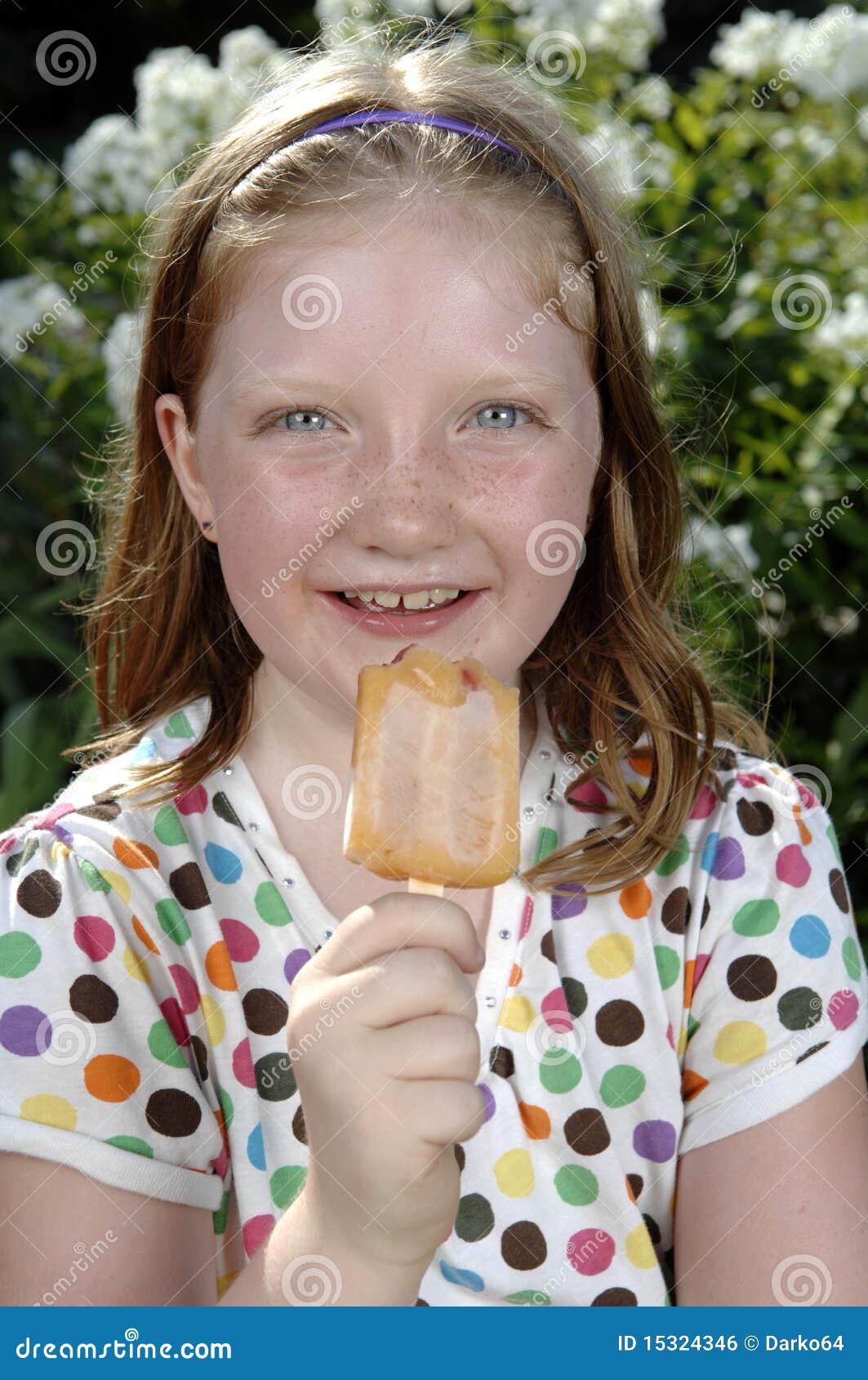 Girl eating popsicle stock photo. Image of girl, blue - 15324346