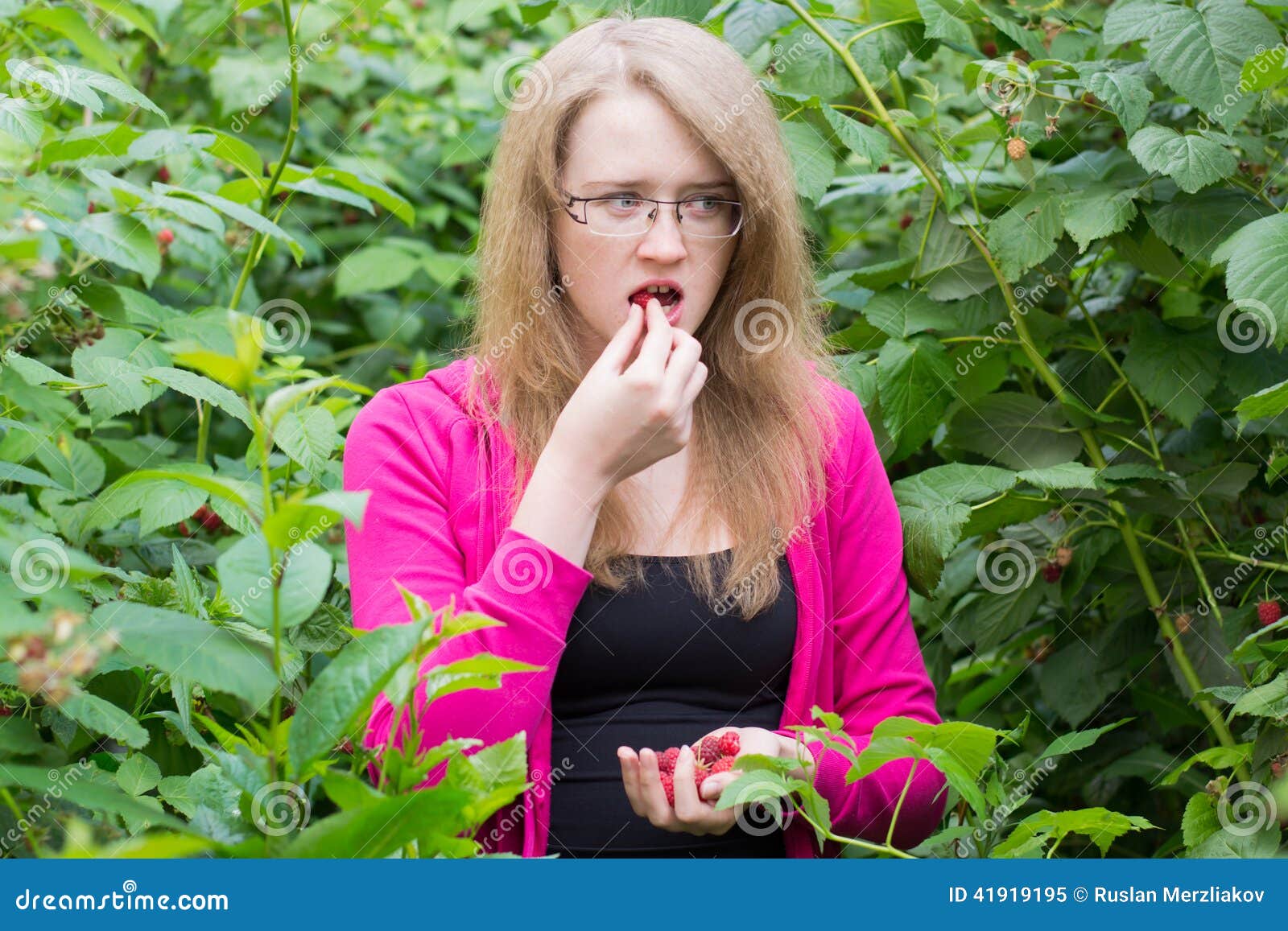 Girl eating raspberries stock image. Image of hair, babies - 41919195