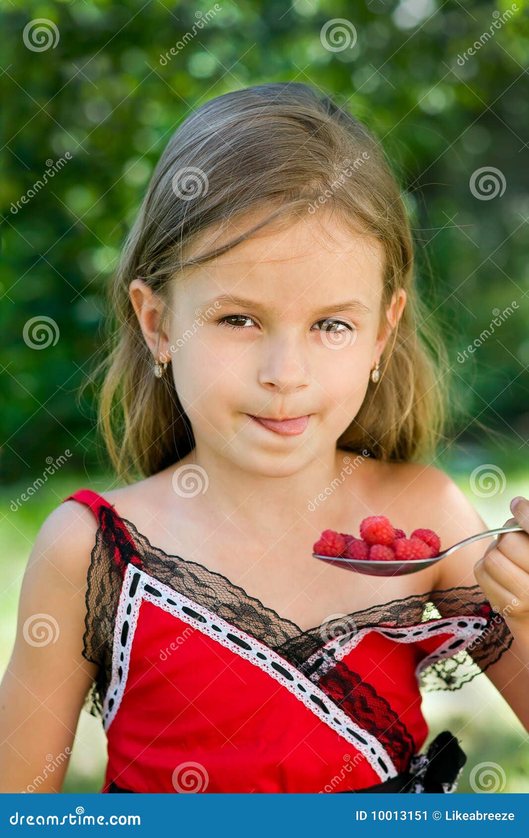 Girl eating raspberry stock image. Image of food, girl - 10013151