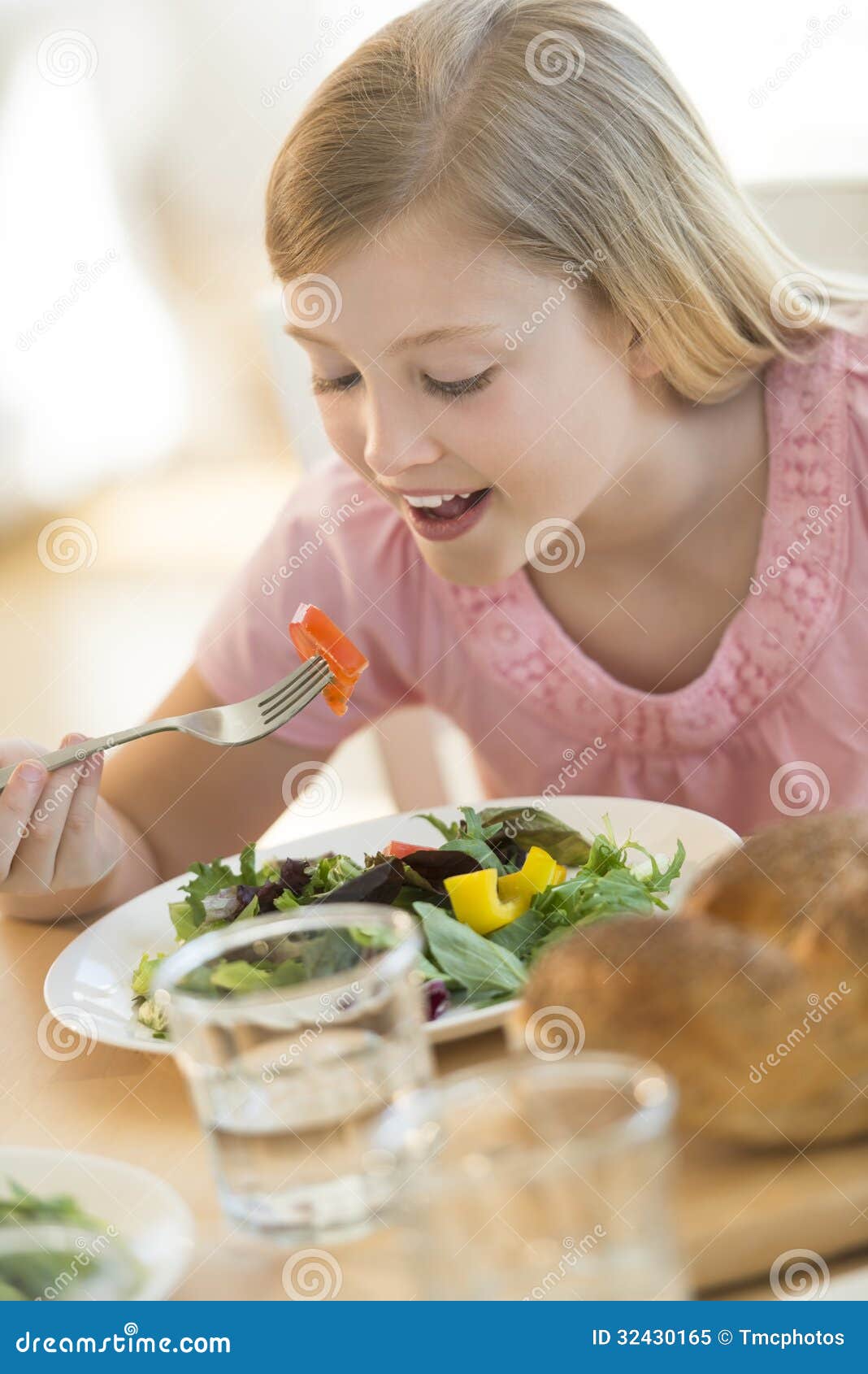 Girl Eating Salad at Dining Table Stock Image - Image of cute, little ...